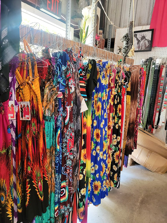 A kaleidoscope of sundresses sways gently in the breeze, each vibrant pattern promising the wearer instant vacation vibes regardless of actual destination.