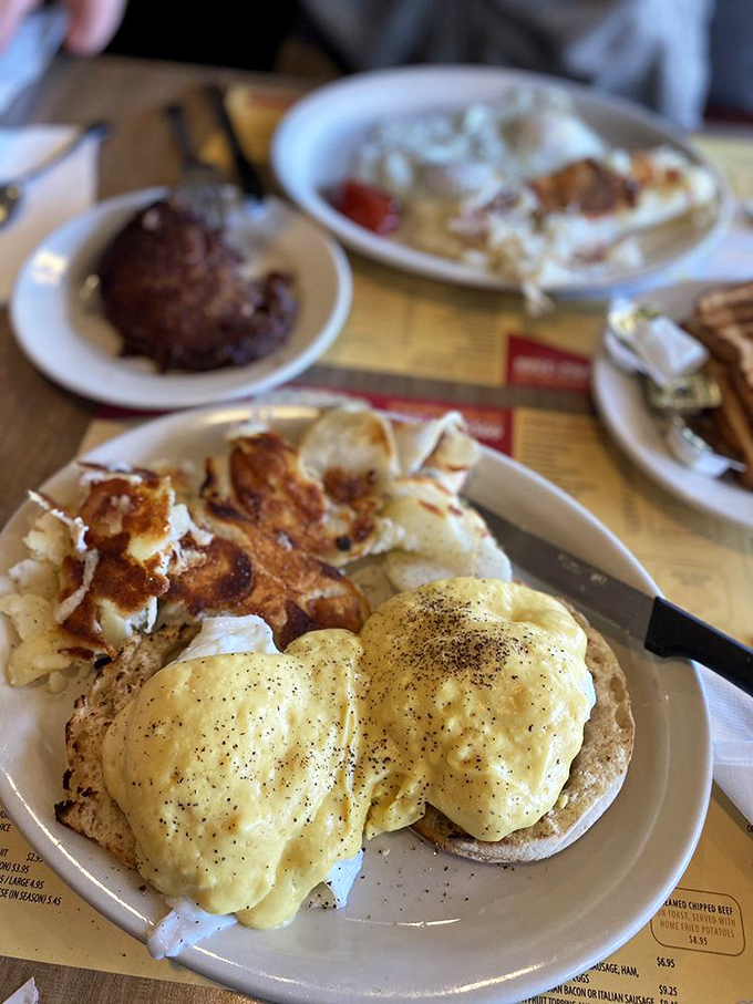 Eggs Benedict done right&mdash;perfectly poached eggs wearing hollandaise like a silky golden robe, with home fries playing the delicious supporting role.