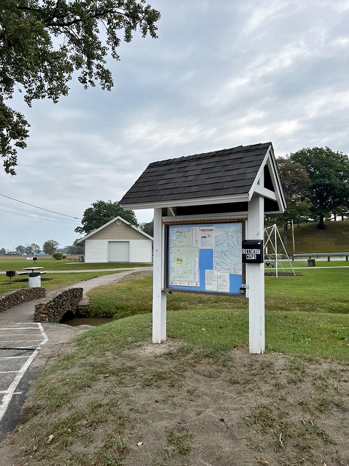 The park's information kiosk stands ready to guide visitors. This little structure has answered more questions than a game show host.