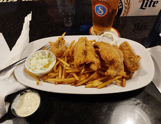 Fish so perfectly golden and crisp, it makes you wonder if the chef has some sort of secret breading technique that should probably be classified.