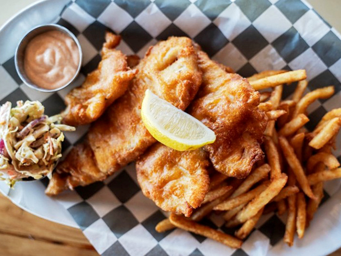 Golden-battered fish that shatters with each bite, paired with fries that could make a Frenchman weep with joy.
