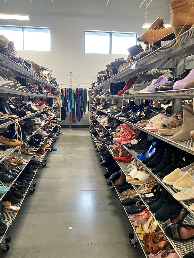 The shoe aisle stretches toward infinity, a leather-and-canvas galaxy where yesterday's impulse buys become tomorrow's perfect fit for someone new.