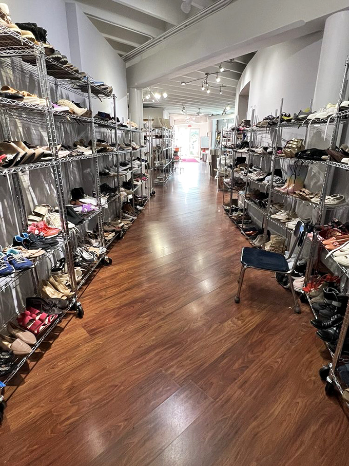 Shoe paradise where Imelda Marcos would lose her mind. The polished floors reflect an endless parade of footwear possibilities.