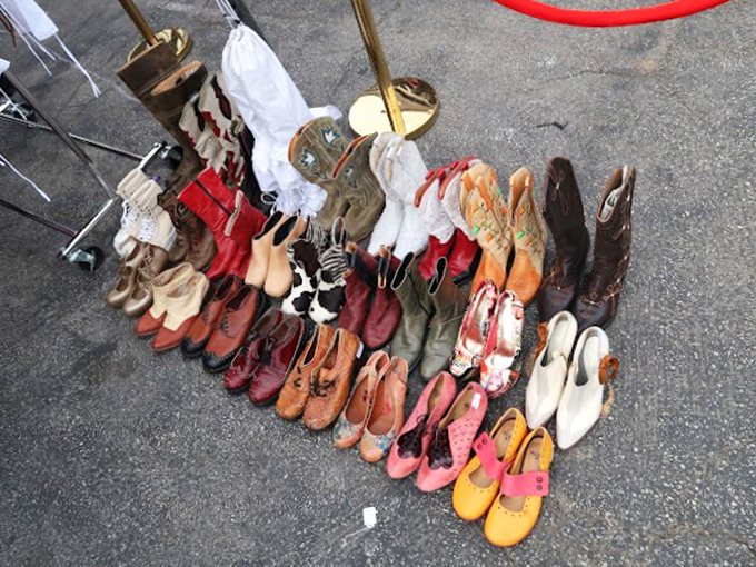 Vintage shoes scattered like stepping stones to fashion history, each pair with its own story.