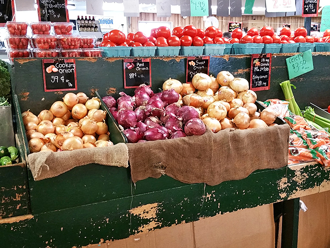 Farm-fresh produce that actually tastes like it should. These vibrant onions and tomatoes weren't born under fluorescent supermarket lights.