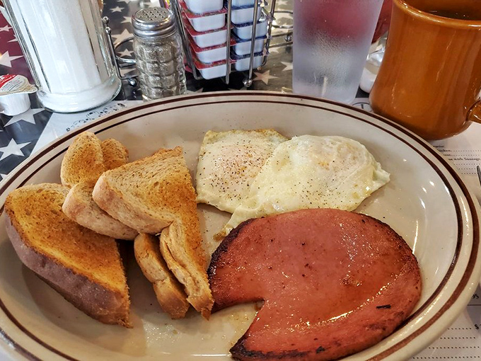 Fried bologna gets the gourmet treatment here, proving that simple ingredients can create extraordinary breakfast memories together.