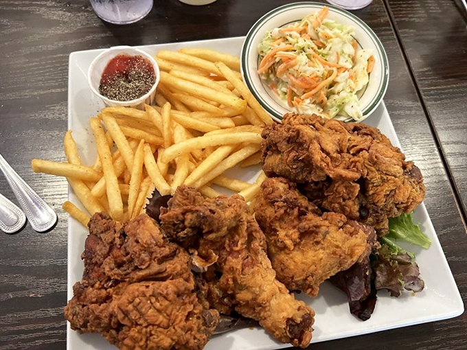 Fried chicken this golden-crisp deserves its own fan club. The perfect ratio of crunch to juicy meat is culinary mathematics at its finest.