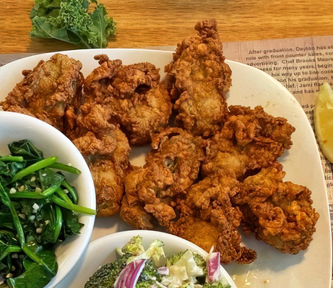 Fried oysters that look like they've been dipped in liquid sunshine. The perfect balance between crispy exterior and that briny ocean treasure within.