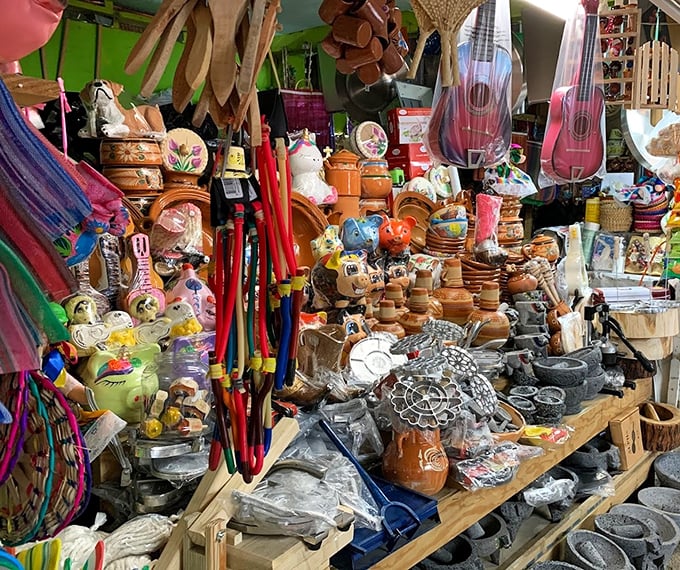 A kaleidoscope of handcrafted treasures where colorful guitars, pottery, and woven goods create a symphony of cultural artistry.