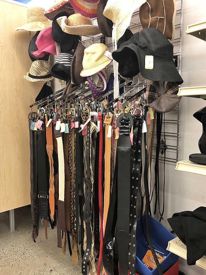 The accessories wall &ndash; where belts, hats, and fashion statements hang in anticipation. Like a buffet of style options, there's something for every taste.