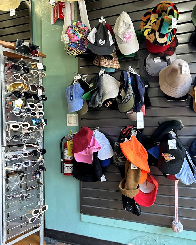 Hat heaven meets sunglasses paradise in this corner where you can literally top off your thrifted ensemble with personality.