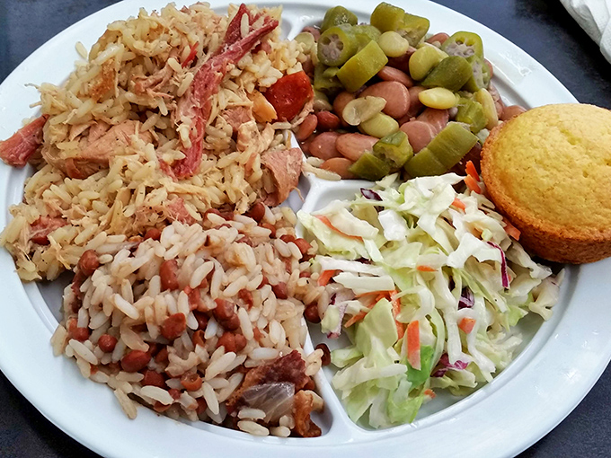 Southern comfort on a plate. Rice and beans sharing space with fresh slaw and cornbread&mdash;a harmony of flavors that sings like a gospel choir.