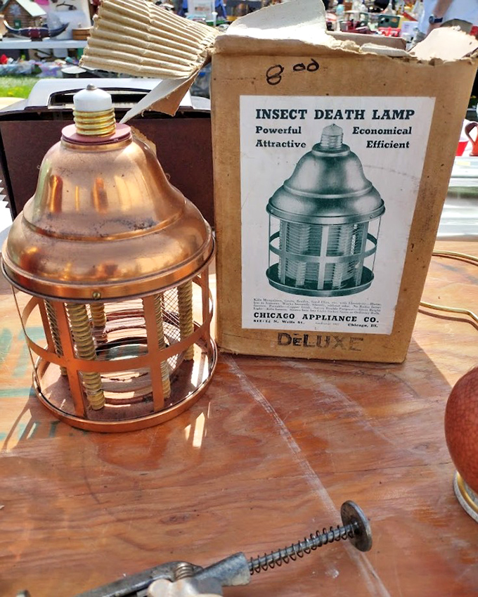 "Insect Death Lamp" &ndash; not exactly subtle marketing from a bygone era! This vintage bug zapper with its original packaging proves advertising used to be refreshingly straightforward.