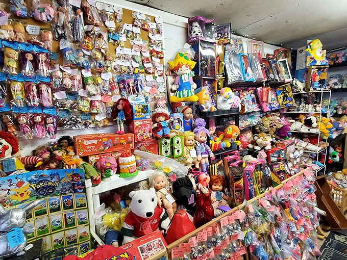 A toy collector's fever dream comes to life in this stall, where dolls from every era stand at attention, waiting for their next loving home.