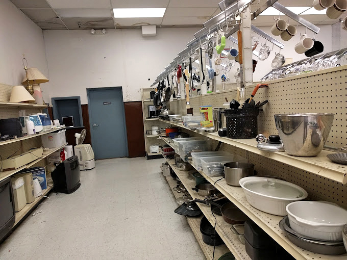 Kitchen department: where your grandmother's cast iron skillet might be waiting alongside someone else's barely-used wedding registry gifts.