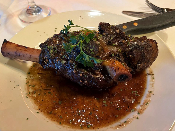The lamb shank glistens in its own rich jus, falling off the bone with such eagerness it practically leaps onto your fork.