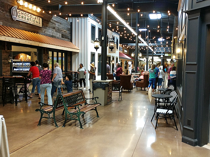 Stars, stripes, and shopping carts—the American dream in retail form. The information booth stands ready to guide lost souls through this shopper's paradise.