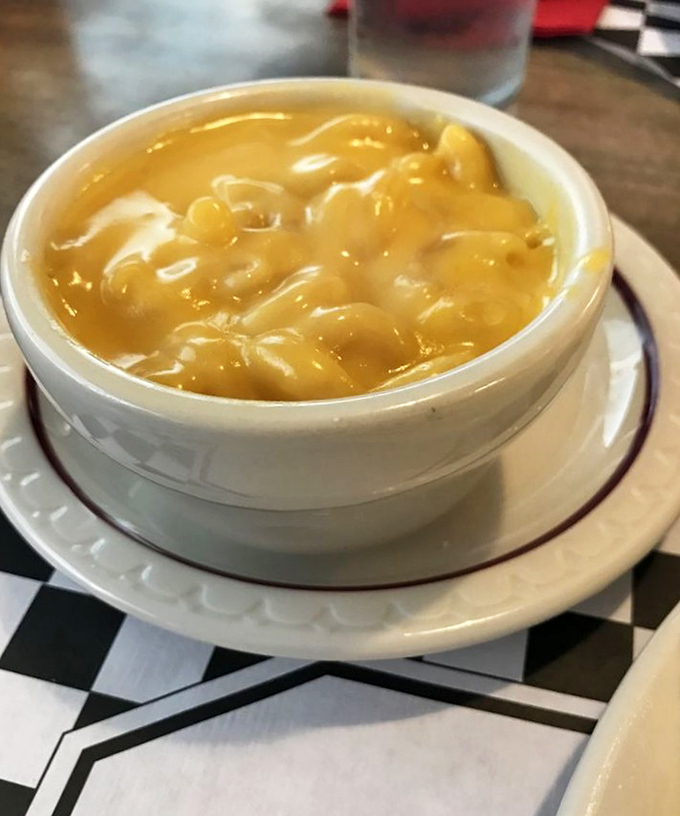 Mac and cheese that makes you wonder why anyone bothered to "elevate" this classic with truffle oil and breadcrumbs when perfection was already on the plate.