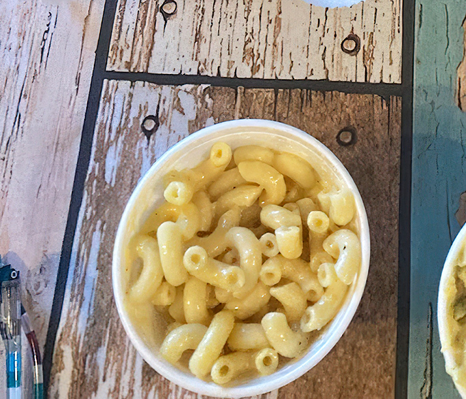 Mac and cheese that achieves that perfect balance between creamy and cheesy. Comfort food that makes you want to hug your plate.
