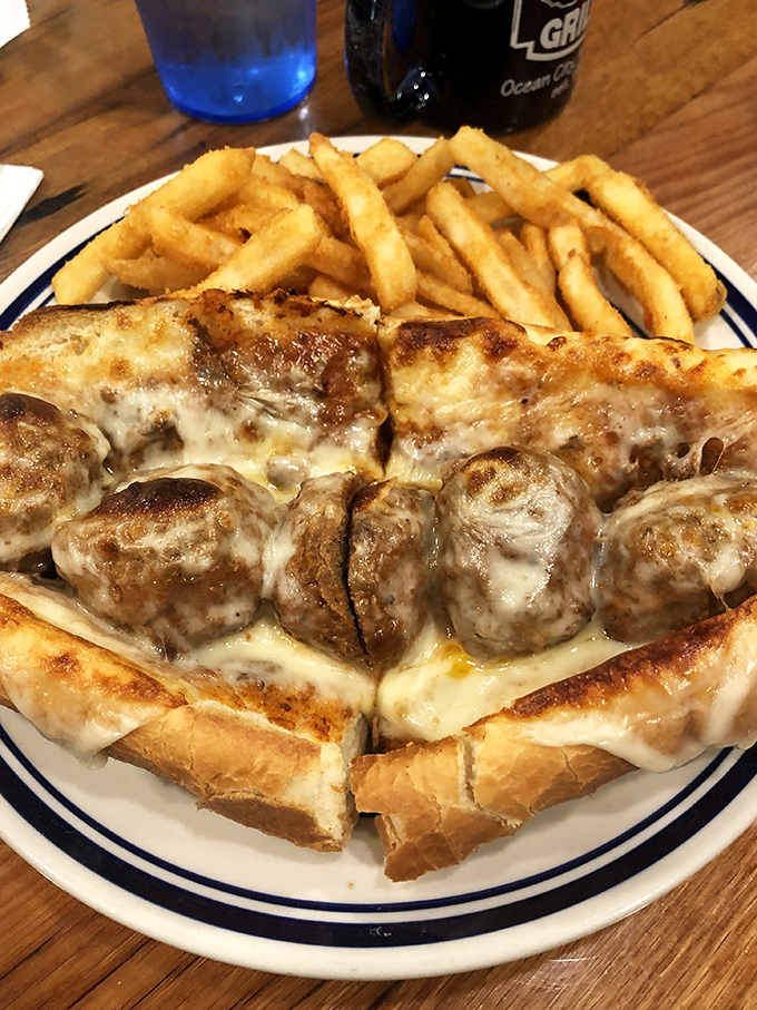 This isn't just a meatball sandwich – it's an architectural marvel of melted cheese, seasoned meatballs, and bread sturdy enough for the challenge.