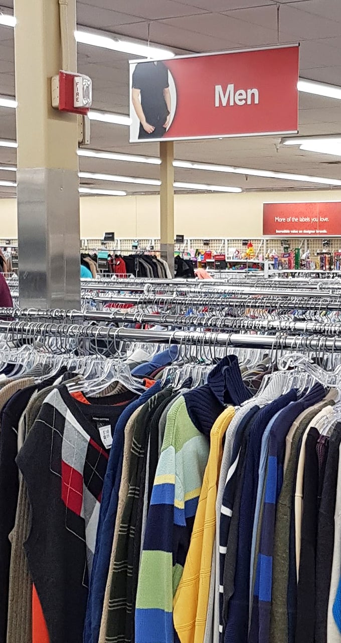 The men's section: where vintage argyle sweaters and barely-worn dress shirts hang like prizes waiting to be claimed by savvy shoppers.