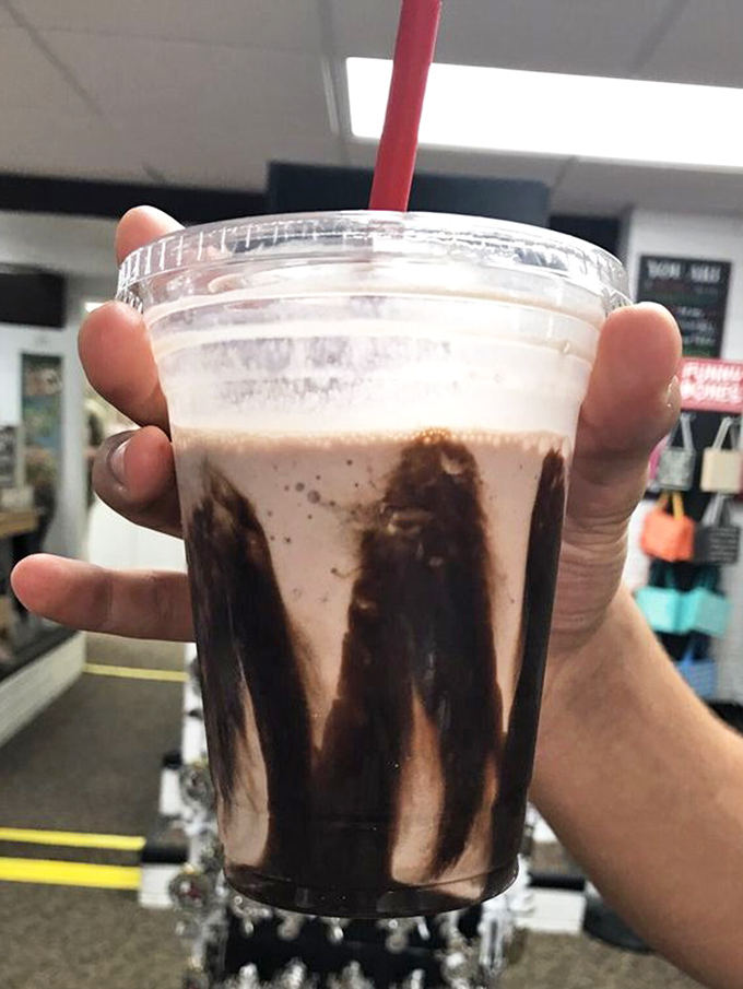 This isn't just a milkshake&mdash;it's a drinkable masterpiece where chocolate performs an interpretive dance against the glass.