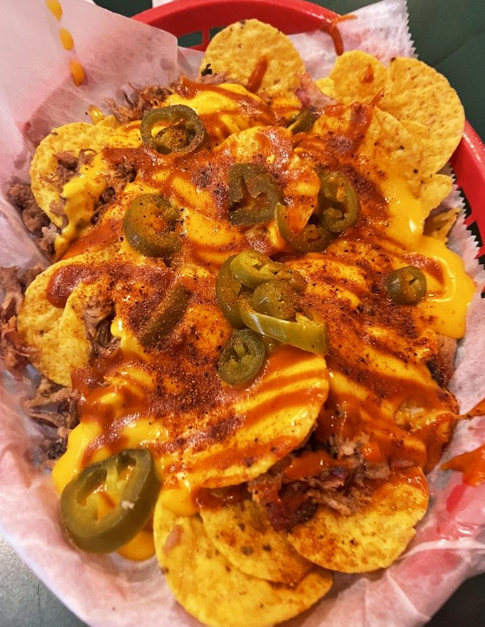 BBQ nachos that don't know the meaning of restraint &ndash; cheese, jalape&ntilde;os, and pulled pork creating a flavor fiesta that demands to be shared.