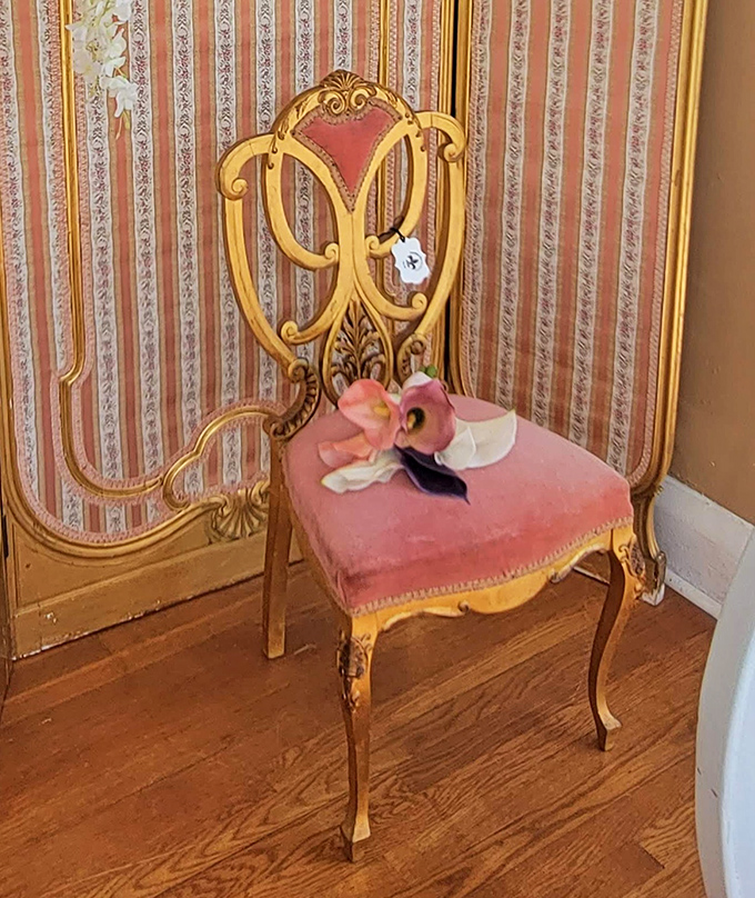 This isn't just a chair&mdash;it's a throne for your inner Victorian aristocrat, complete with gold flourishes and blush velvet that screams "paint me like one of your French girls."