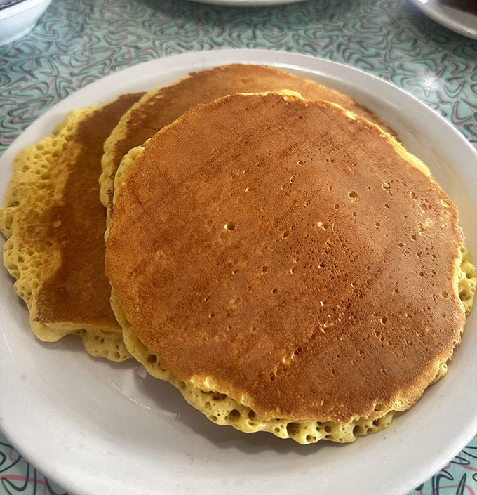Golden pancakes with the perfect balance of fluff and substance. Like edible sunshine that somehow makes Michigan mornings better.