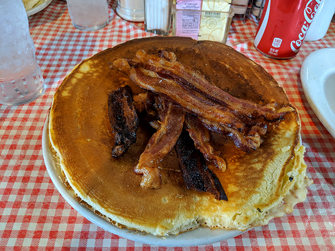 That's not just a pancake&mdash;it's a golden disk of joy topped with bacon that's achieved the perfect balance between crispy and chewy.