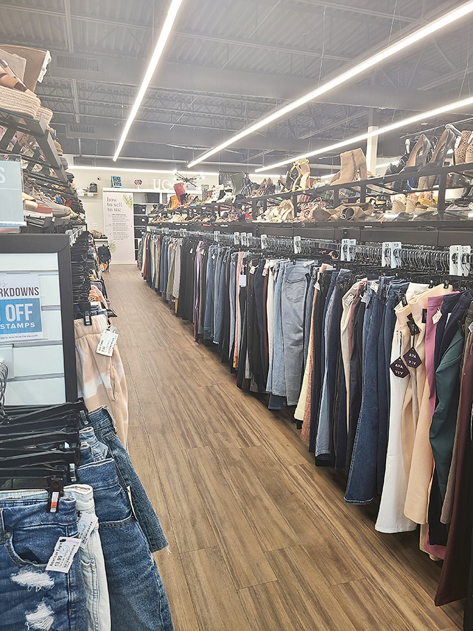 The denim lineup tells fashion stories from previous lives, each pair waiting for new adventures with fresh owners.