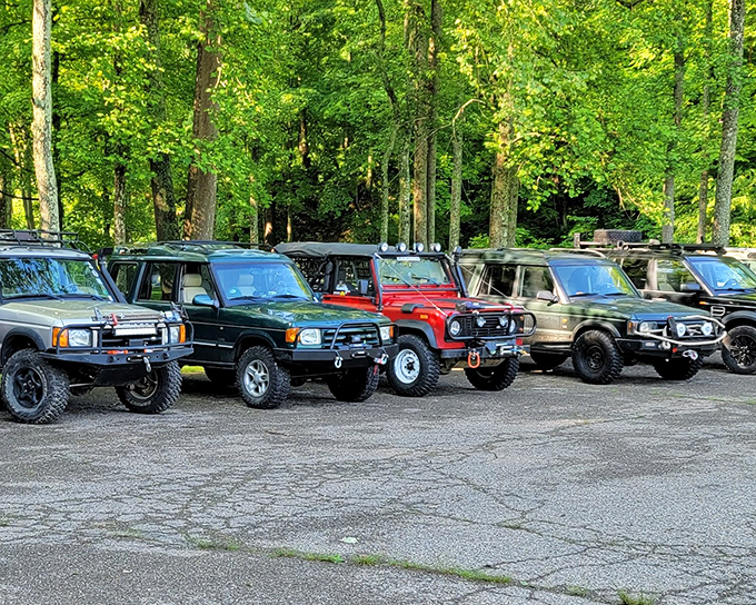 Adventure vehicles assemble! The parking area serves as base camp for explorers ready to trade horsepower for footpower on Tar Hollow's trails.
