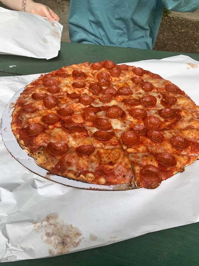 Those pepperoni cups are tiny flavor reservoirs, each one collecting a precious pool of spicy oil. This isn't eating&mdash;it's a religious experience.