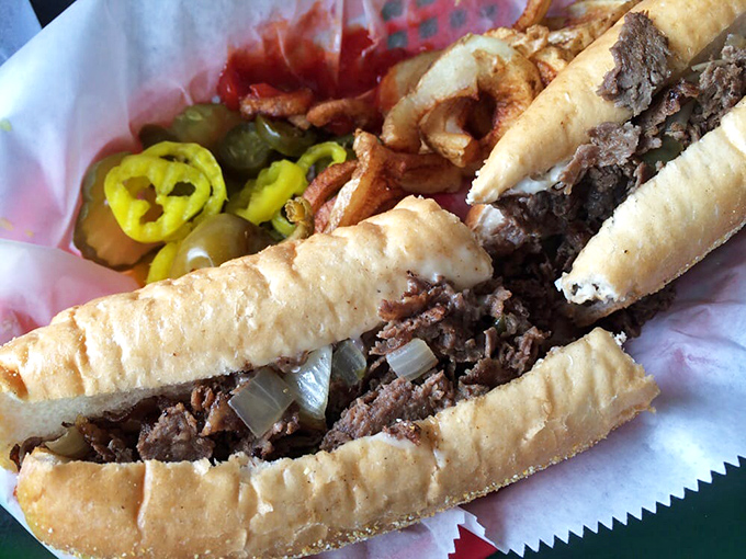 This isn't just a sandwich; it's a commitment. Thinly sliced beef, melted cheese, and those perfectly grilled onions create the Philly cheesesteak of your dreams.