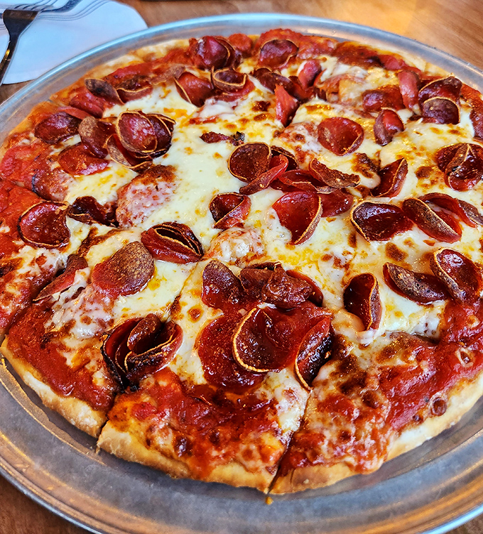 Pizza perfection isn't complicated—just quality ingredients handled with respect. Those curled pepperoni edges are where the magic happens.