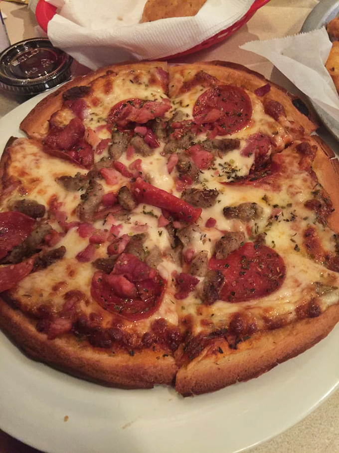 Pizza that would make an Italian grandmother nod in approval. The meat-to-cheese ratio here is what mathematicians call "the golden ratio of deliciousness."