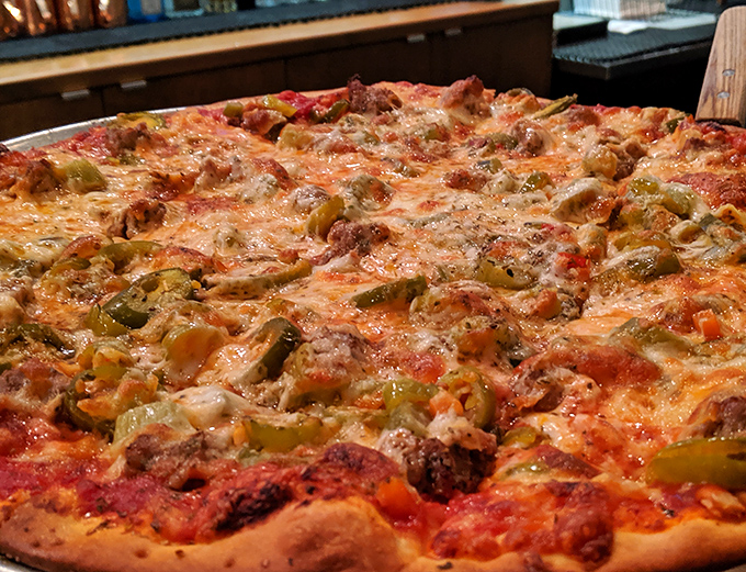 Pizza perfection that would make an Italian grandmother nod in approval&mdash;crispy, cheesy, and loaded with enough toppings to require a strategy.