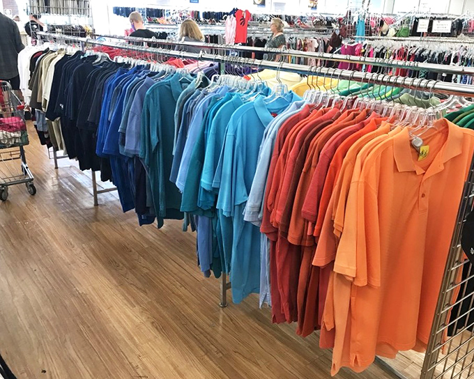 The men's section organized by color&mdash;a Type-A personality's dream come true. Like walking through a preppy rainbow of second chances.