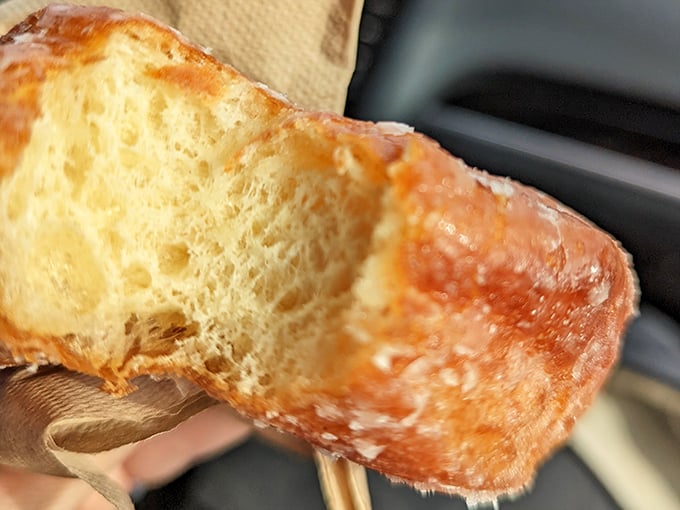 A donut with the perfect golden exterior that shatters just right when bitten. This isn't just fried dough—it's morning sunshine in edible form.