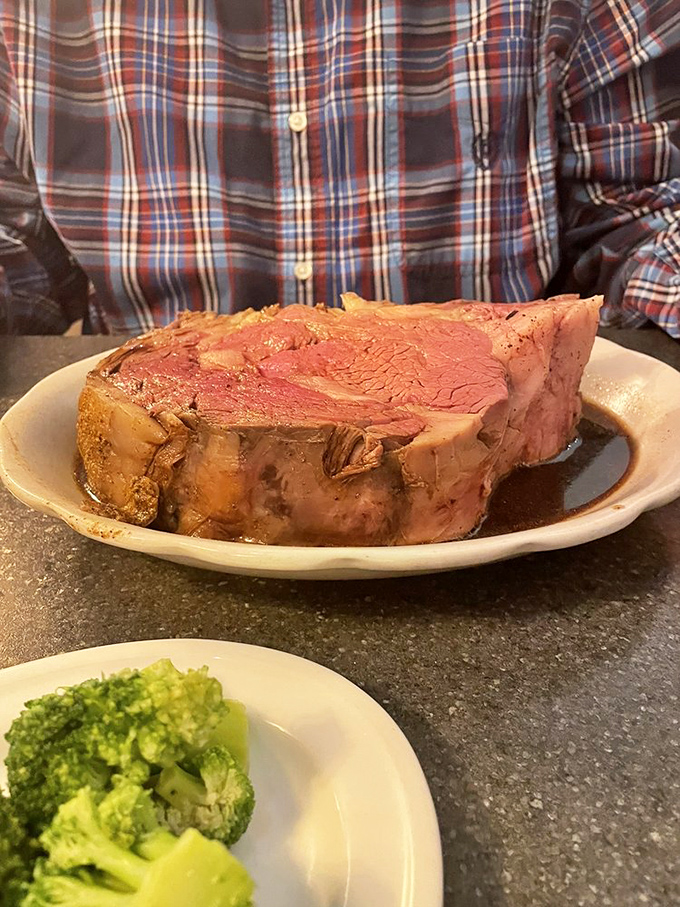 The prime rib &ndash; pink as a sunset, juicy as gossip, and portioned like they want you to hibernate for winter. This is meat that means business.