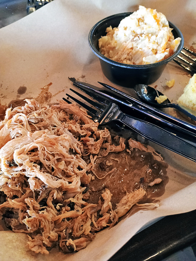 Pulled pork so tender it practically surrendered to the smoker, paired with creamy mac and cheese that would make any Southern grandmother nod in approval.
