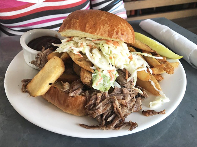 This pulled pork sandwich proves that lunch can be just as spectacular as their legendary breakfast offerings.