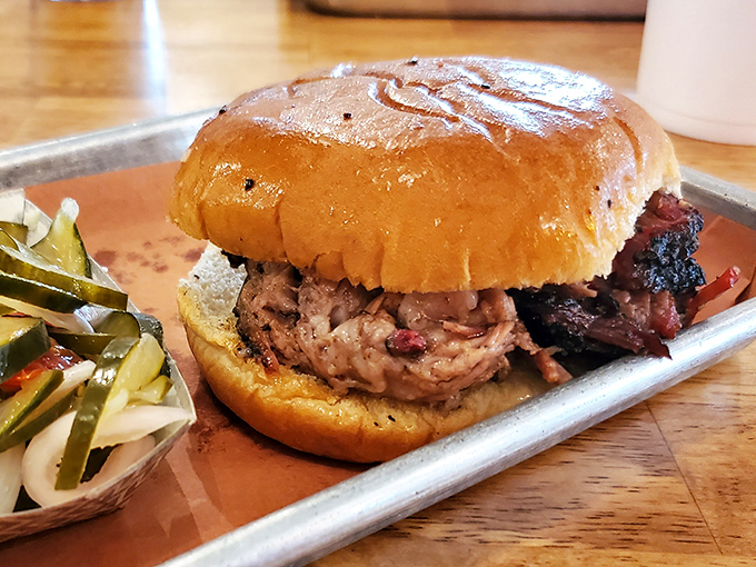 The pulled pork sandwich&mdash;humanity's greatest achievement since the moon landing. That soft bun cradles smoky perfection like it's holding a newborn.