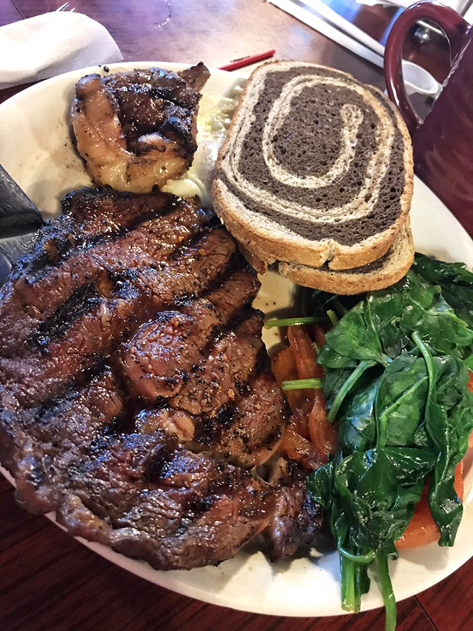 Behold the ribeye that launched a thousand return trips &ndash; charred outside, tender inside, enormous all over.