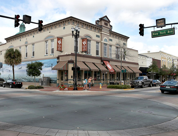 Corner buildings anchor DeLand's historic downtown, where brick facades have witnessed generations of Florida stories unfold.