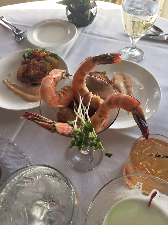 Gulf shrimp so perfectly poised in their cocktail glass, they look like they're auditioning for the seafood version of Swan Lake.