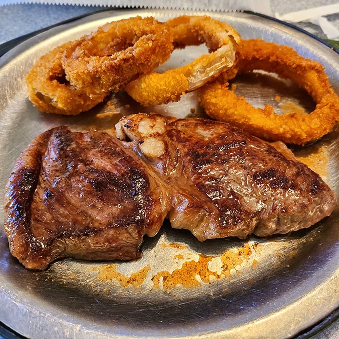 Sirloin steak meets golden onion rings &ndash; a partnership more perfect than Bogart and Bacall, with similar sizzle.