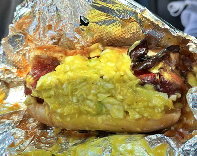 The humble sausage, elevated to art form through smoke and time, glistening with promise and begging to be devoured.