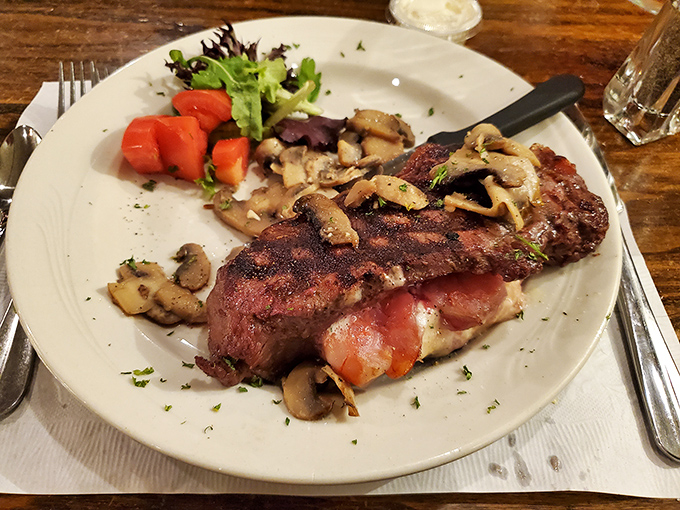 A perfectly seared steak that doesn't need fancy explanations&mdash;just mushrooms, a touch of char, and the quiet confidence of being done right.