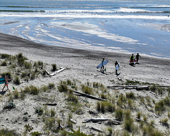 Beach day economics: One surfboard + endless waves = the kind of wealth no stock market can match.